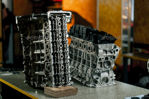 engine block on the table the mechanic opened the locking valve ...