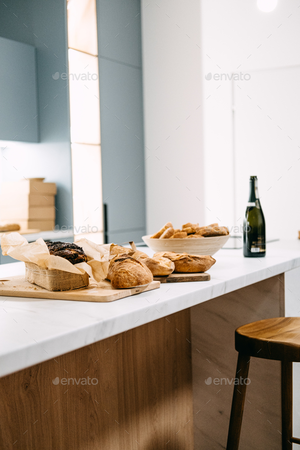 Artisan Bread Display in Modern Kitchen Setting Stock Photo by ...