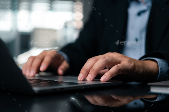Close-up hand professional man typing keyboard on a modern laptop Stock ...