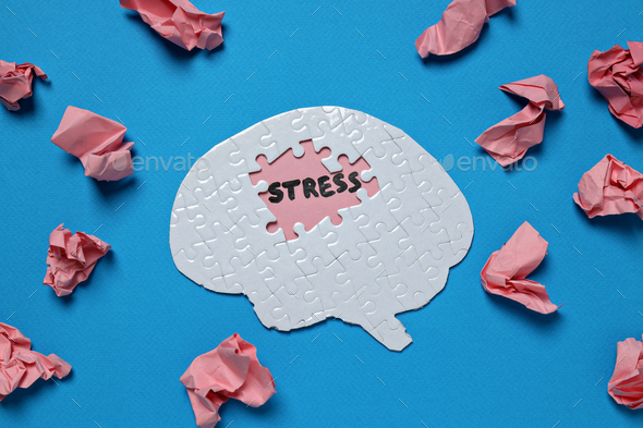 Stress theme concept, brain in puzzle shape with crumpled paper. Stock ...