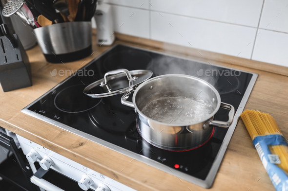 Boiling water in cooking pot Stock Photo by kuban-kuban | PhotoDune