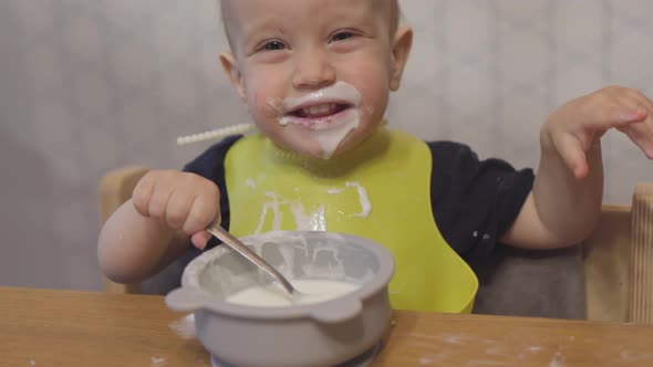 Funny Baby Toddler Learning to Eat with Spoon Child Learn Eating Use ...