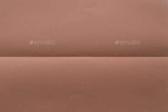 Folded peach color paper for background. Stock Photo by rfaizal707