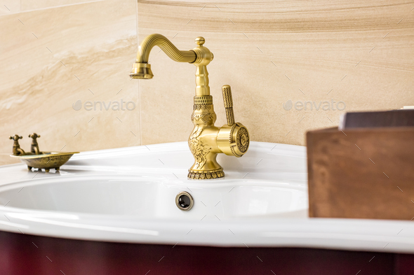 Water tap sink with faucet in vintage chinese style in expensive loft ...
