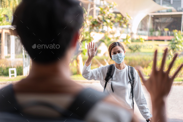 Two asian tourist to saying goodbye when comeback from vacation trip ...