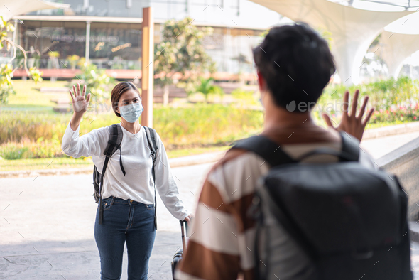 Two asian tourist to saying goodbye when comeback from vacation trip ...