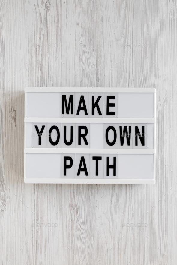 'Make your own path' words on a modern board, clipboard with blank ...