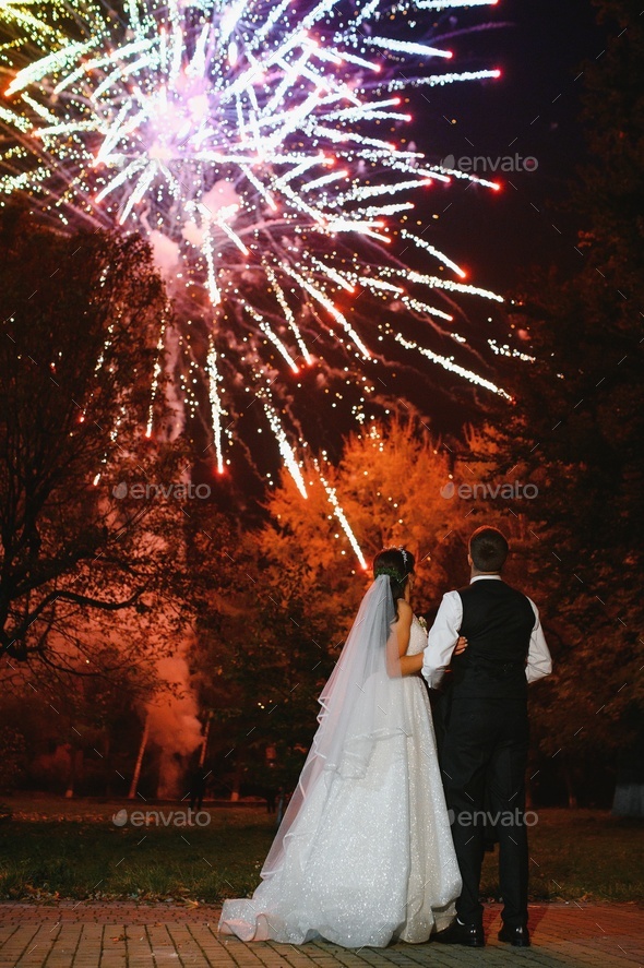 Back view of lovely married couple stand backs to camera Stock Photo by ...