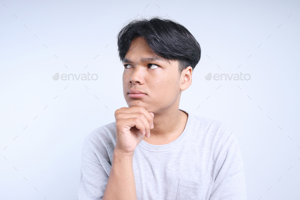 Closeup Young Asian Man Thinking Stock Photo by Queenmoonlite35 | PhotoDune