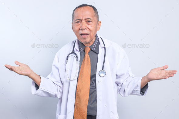 Confused Senior Doctor Shrugging Shoulder Stock Photo by Queenmoonlite35