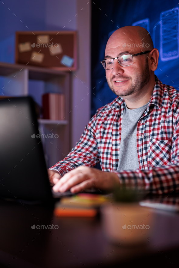 Web developer working late in home office Stock Photo by vladans ...
