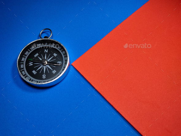 Selective focus.Compass with colorful background Stock Photo by Azrin90