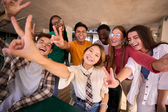 Portrait group of cheerful young multiracial university students posing ...