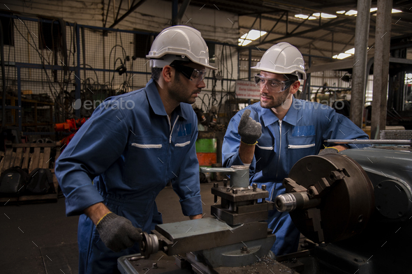 Industry engineer wearing safety uniform helmet and glove control ...