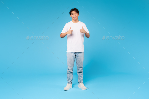 Full body shot of a cheerful young guy Stock Photo by Prostock-studio