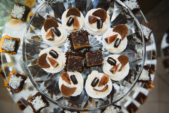 desserts with fruits, biscuits. Different types of sweet pastries ...