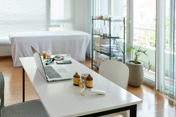 Table of Doctor in Medical Clinic Stock Photo by DragonImages | PhotoDune