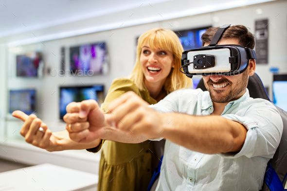 Group of people using virtual reality headset at exhibition, show. VR ...