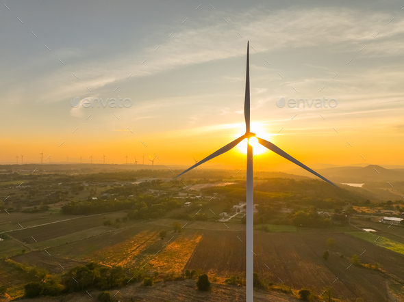 Wind farm field and sunset sky. Wind power. Sustainable, renewable ...