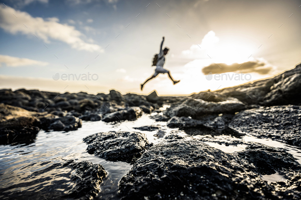 Happy traveler man enjoying freedom running outside Stock Photo by ...