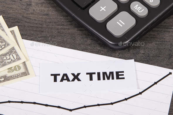 Rising graph showing tax increases, calculator and dollar banknotes ...