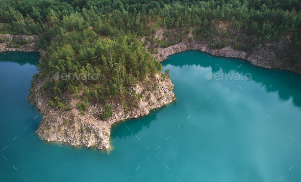 Azure lake with island, trees, and birdseye view Stock Photo by ORION ...