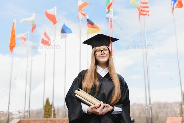 Educational theme: graduating student girl in an academic gown. Stock ...