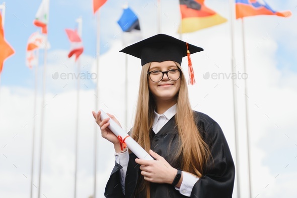 Educational theme: graduating student girl in an academic gown. Stock ...