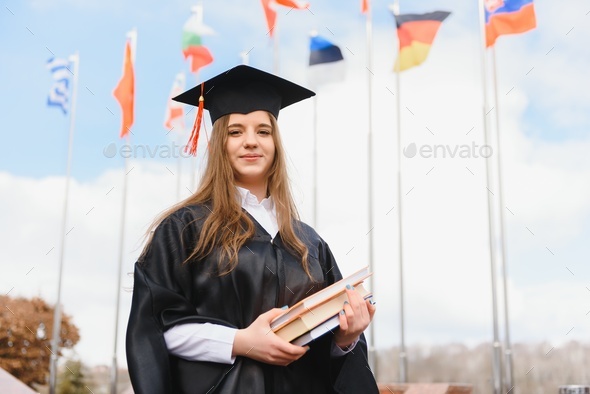 Educational theme: graduating student girl in an academic gown. Stock ...