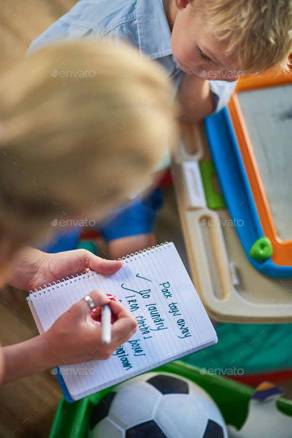 Getting chores done together Stock Photo by YuriArcursPeopleimages