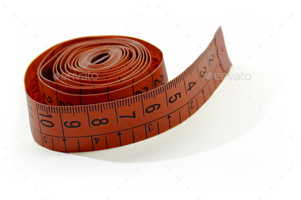 Rolled measuring tape on white background Stock Photo by ozaiachin