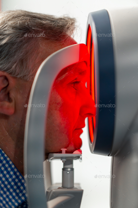 in ophthalmology clinic elderly patient is diagnosed with a vision test ...