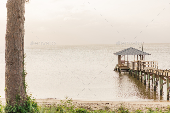 Wooden shack on a pier over the water in Fairhope, AL Stock Photo by ...