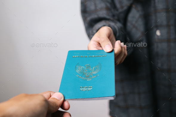 Indonesia Passport Immigration Check Stock Photo by Queenmoonlite35