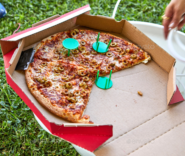 Italian pizza with tomato sauce in opened cardboard box Stock Photo by ...
