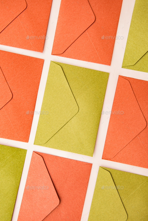 Layout of multicolour envelopes on desk. Envelope pattern background ...