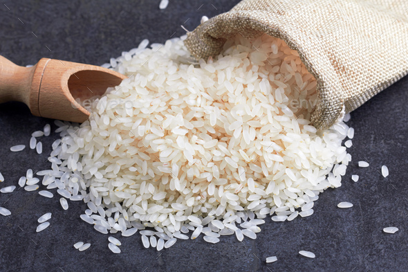 Rice in bag Stock Photo by pioneer111 | PhotoDune