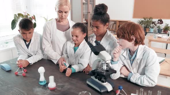 Female Science Teacher Showing Experiment to Kids, Stock Footage ...