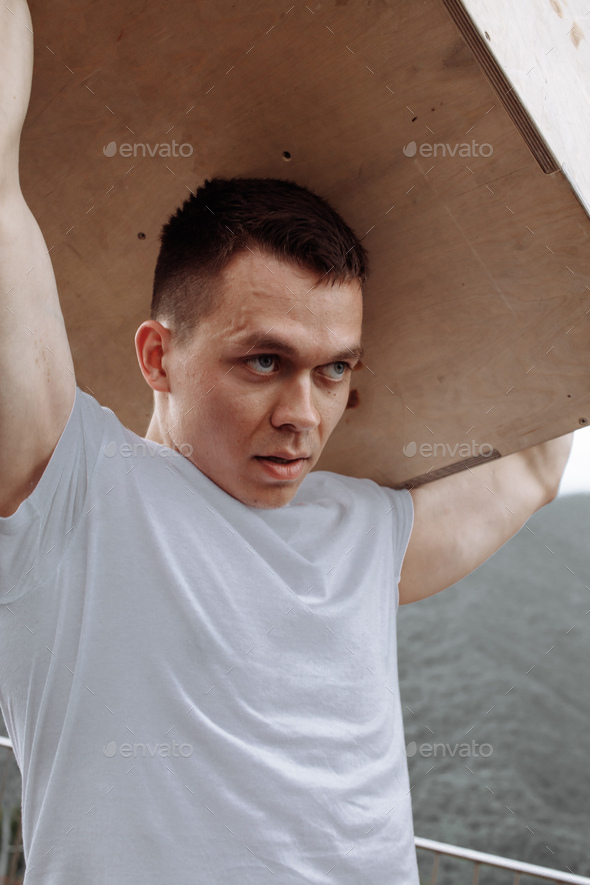 Cross Fit Weight Lifting exercise man workout outdoor, lifting heavy ...