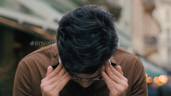 Close up upset frustrated Indian Arabian ethnic male student man guy ...