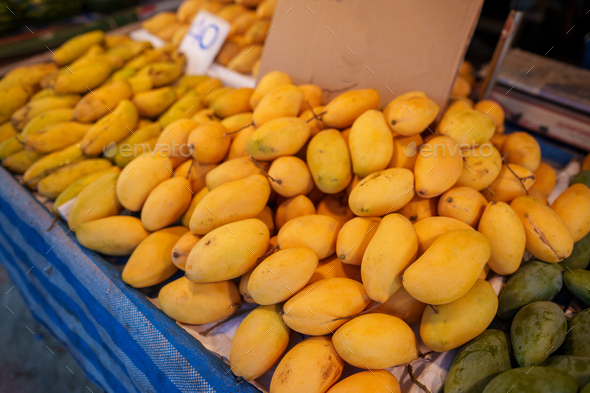 Ripe mangoes at the roadside market Stock Photo by ArtRachen | PhotoDune