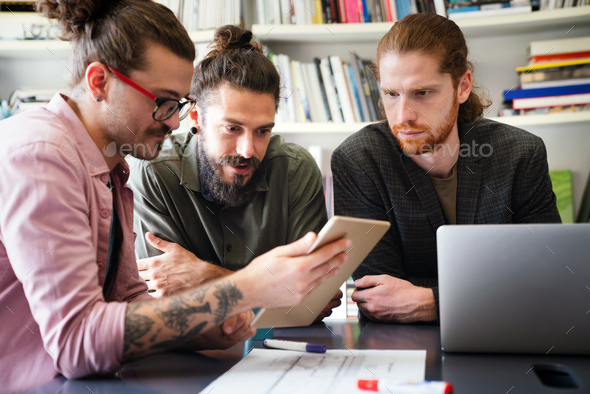 Mixed team of software engineers brainstorming ideas. Diverse app ...