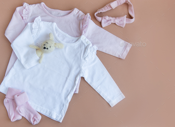 Set of pink clothes and accessories for newborn baby. Stock Photo by ...