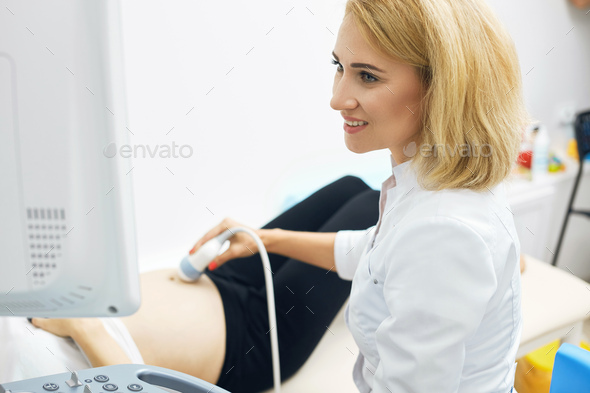 positive medical worker using sonographic instrument Stock Photo by ...