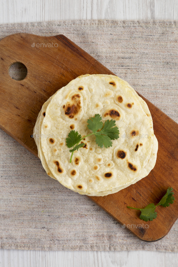 Homemade Roti Chapati Flatbread on a rustic wooden board, top view ...