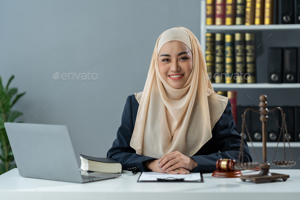 Hijab asian muslim female lawyer, lawyer, sitting with hands holding ...