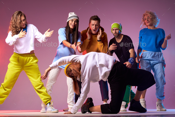 Active group of dancers in dance hall Stock Photo by Albertshakirov