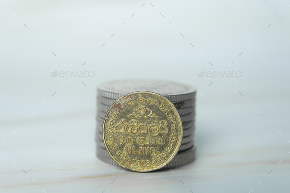 Stack of Nepalese one-rupee coins Stock Photo by wirestock | PhotoDune
