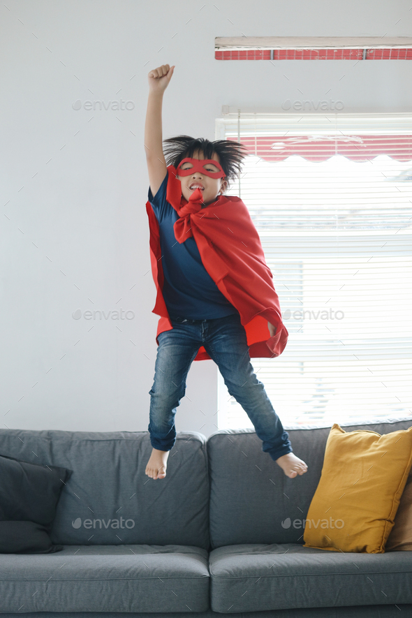 Superhero Kid Jumping Stock Photo by Garakta-Studio | PhotoDune