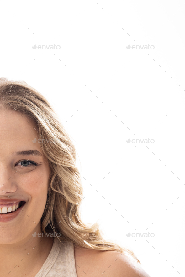 Caucasian plus-size child model, brown hair, blue eyes, smiles, white ...